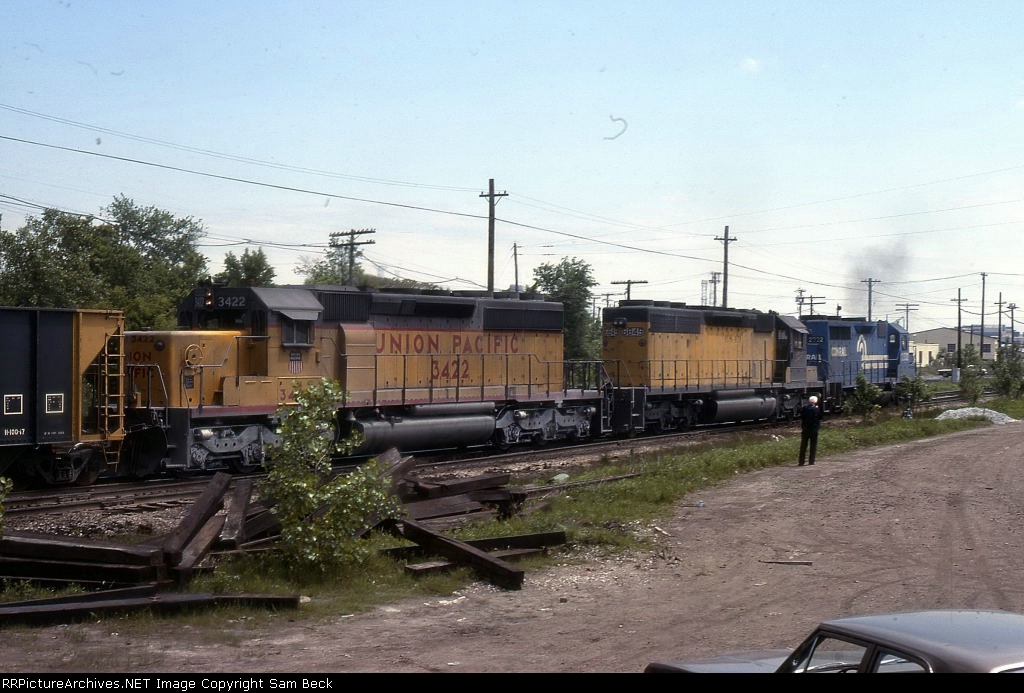 UP 3422, CNW 6849, and CR 2332